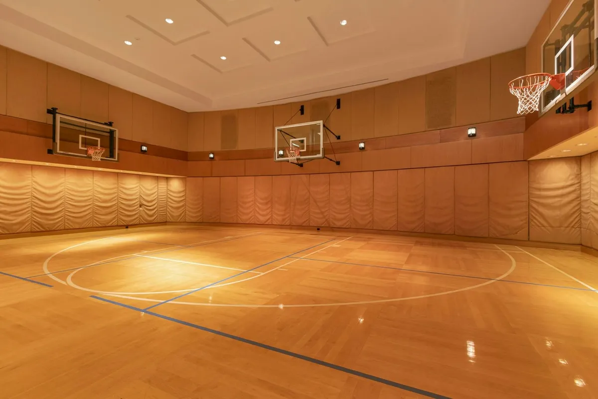 A Look Inside Luxury Homes Featuring Indoor Basketball Courts